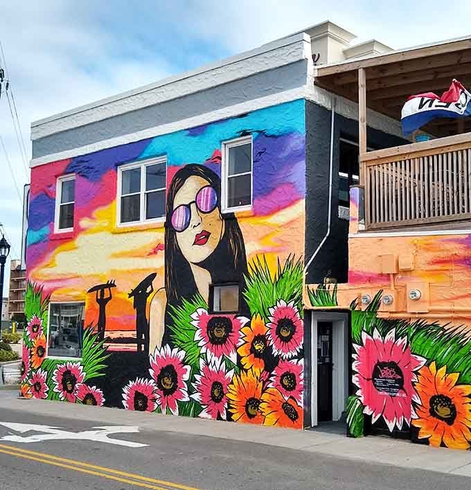 Street art transforms ordinary buildings into extraordinary canvases, proving that creativity thrives best near the sea and sunshine.