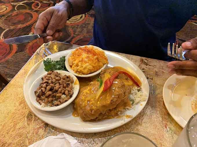 That smothered pork chop with gravy could make a vegetarian reconsider their entire life philosophy, honestly.