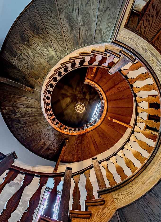 This spiral staircase winds upward like something straight out of a Hitchcock film, minus the suspense.