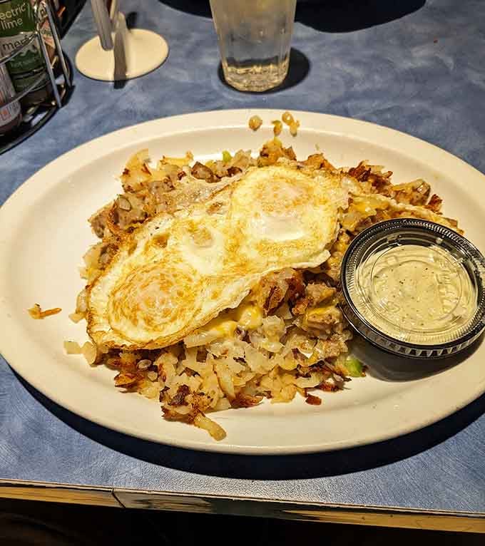 The Village Unusual Skillet lives up to its name with eggs, hash browns, and enough melted cheese to fuel your entire day.