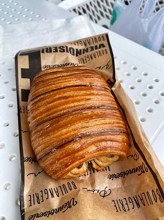 Behold the croissant in its natural habitat: golden, flaky, and about to make your entire morning worthwhile.
