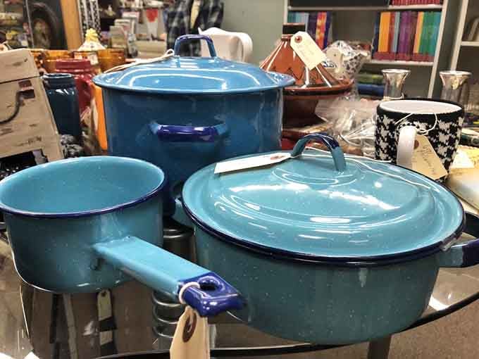 Vintage enamelware in turquoise blue, because your grandmother's cookware had more style than most modern kitchens combined.