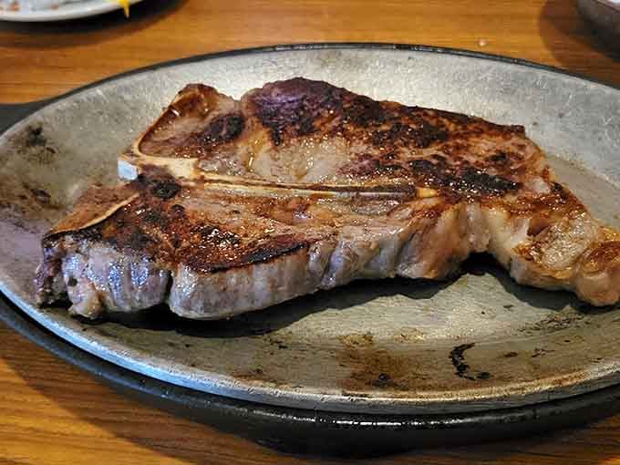 That gorgeous char and perfect sear on this porterhouse proves some things are worth the wait.