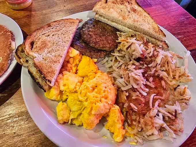 A breakfast plate so loaded it practically needs its own zip code and a forklift to deliver.