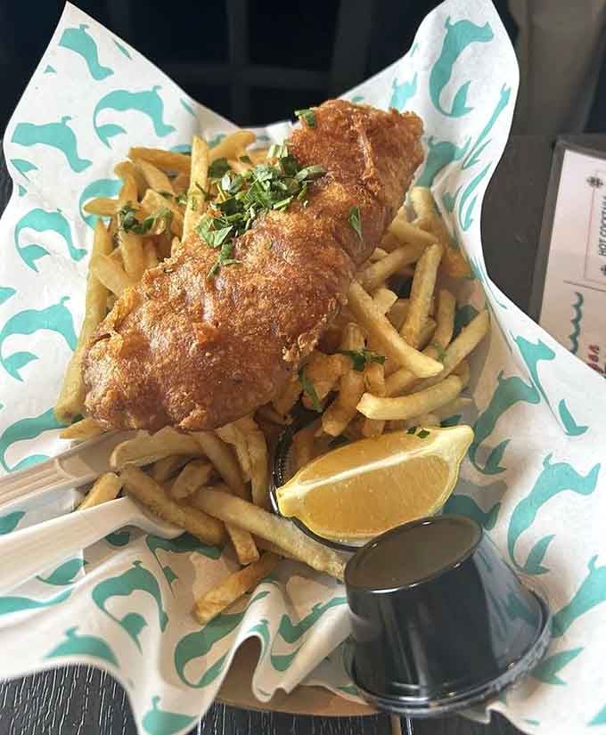 Golden, crispy perfection meets tangy tartar sauce in a fish and chips experience that rivals coastal classics.