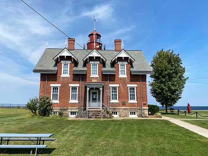 The Dunkirk Lighthouse stands like a brick sentinel, guiding ships and reminding everyone that history still matters here.