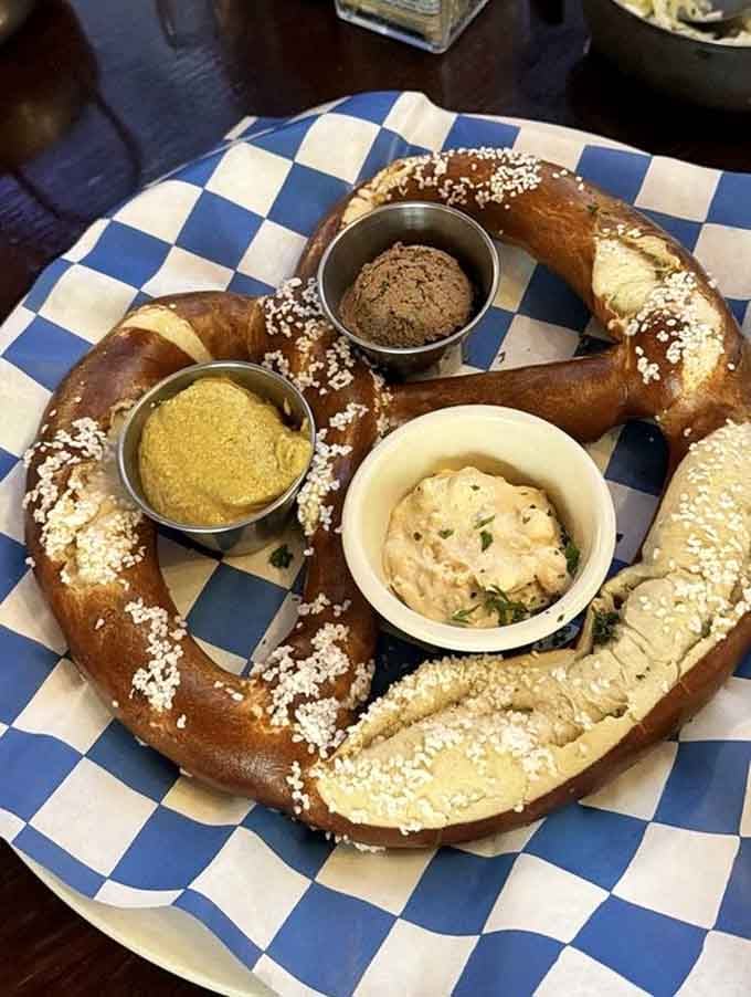 Behold the Giant Bavarian Pretzel, served with three mustards because one would be an insult to its magnificence.