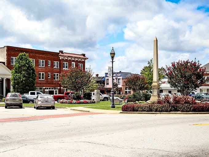 This is what a town square should look like: monuments, flowers, and buildings that remember when handshakes meant something.