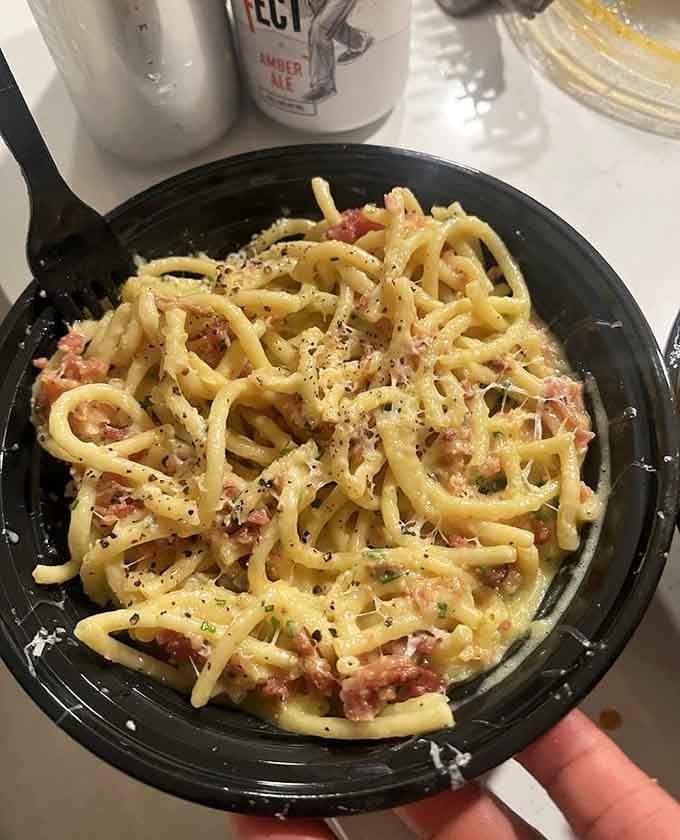 Creamy carbonara with bacon and black pepper proves that simple ingredients can create extraordinary comfort in a bowl.