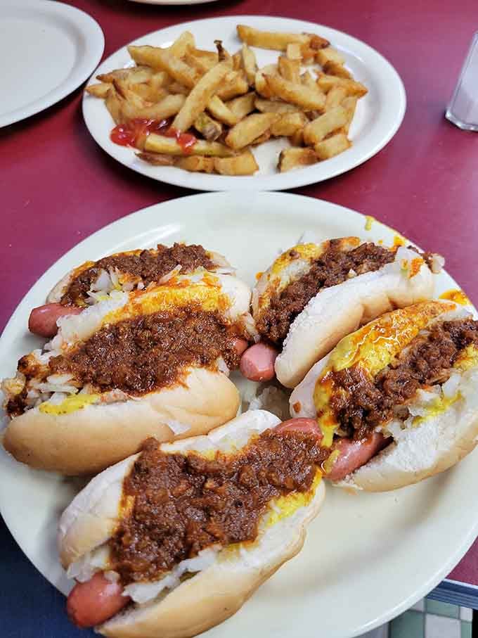 Four little beauties loaded with meat sauce, mustard, and onions prove that good things absolutely come in small packages.