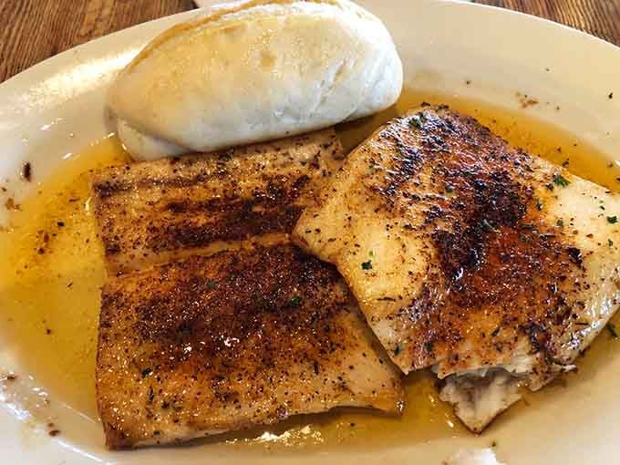 Blackened cobia with that perfect spice crust proves sometimes the simplest preparations let the freshest fish shine brightest.