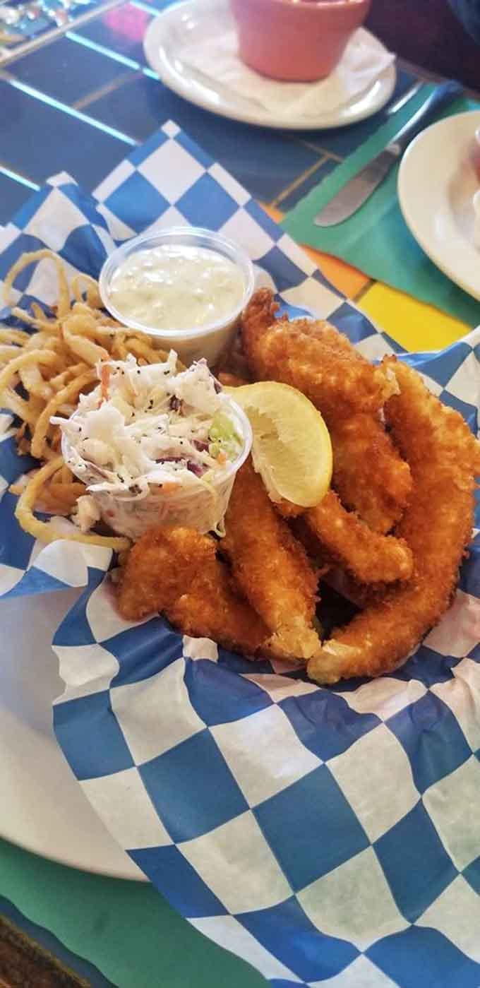 Golden, crispy perfection that proves not all heroes wear capes &ndash; some come with coleslaw and tartar sauce instead.