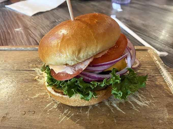 Behold the burger that proves simplicity and smoke can create something more beautiful than most people's wedding photos.