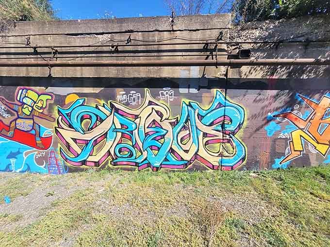 Street art meets classical architecture, proving that every generation leaves its mark on history's canvas.