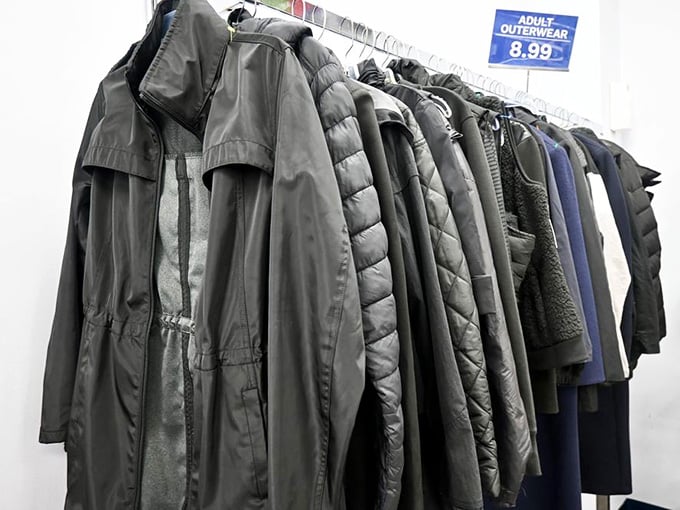 Winter coats lined up like soldiers, ready to keep you warm without freezing your bank account.