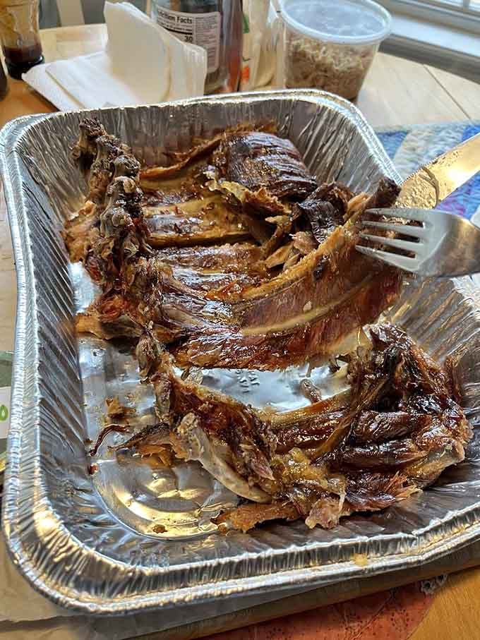 These glistening ribs are what barbecue dreams are made of, tender enough to fall off the bone with just a glance.