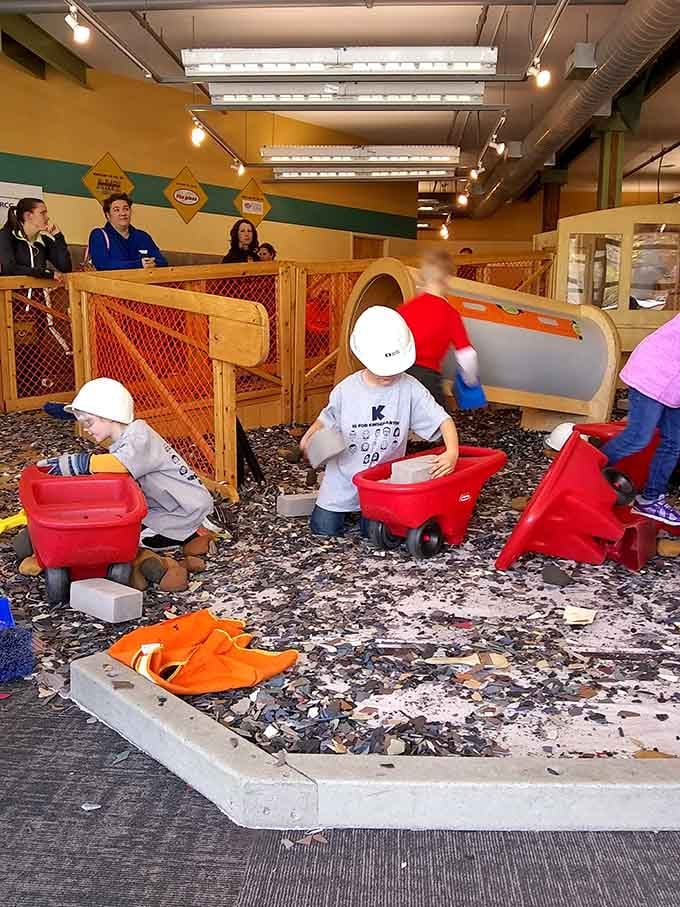 Hard hats on, safety first: future contractors learning that construction zones require both focus and red wagons.