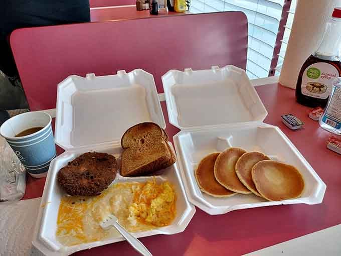 Pork chop, scrambled eggs with cheese, toast, and pancakes prove breakfast doesn't need to be complicated to be perfect.