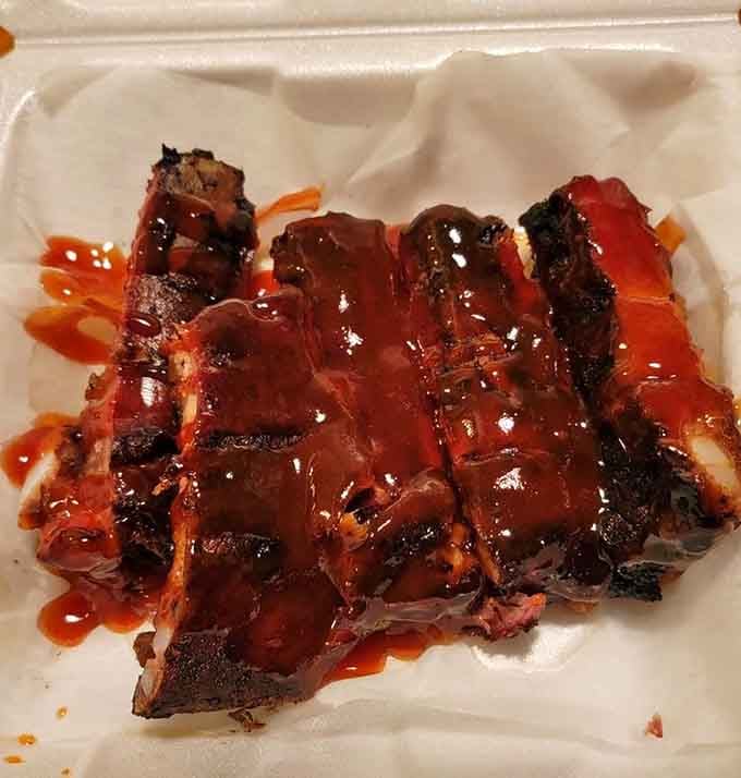 These ribs are what barbecue dreams are made of, glistening with sauce and falling-off-the-bone tender perfection.