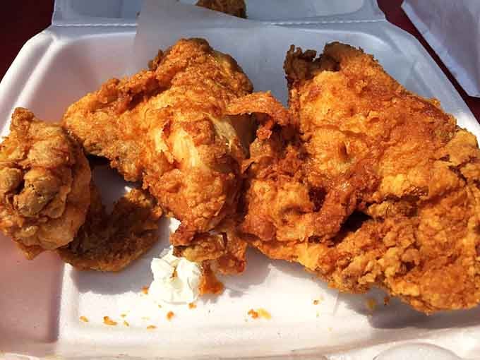 Golden, crispy perfection that makes you understand why people drive miles out of their way for this chicken.