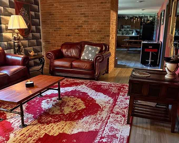 Leather armchairs and castle walls create the perfect spot for plotting adventures or just enjoying some peace.