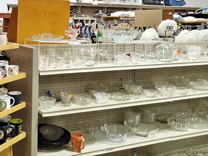 Crystal bowls and vintage glassware lined up like soldiers, waiting to grace your next dinner party beautifully.