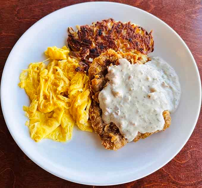 Golden hash browns, perfectly cooked eggs, and chicken fried steak smothered in gravy: this is what breakfast champions are made of.