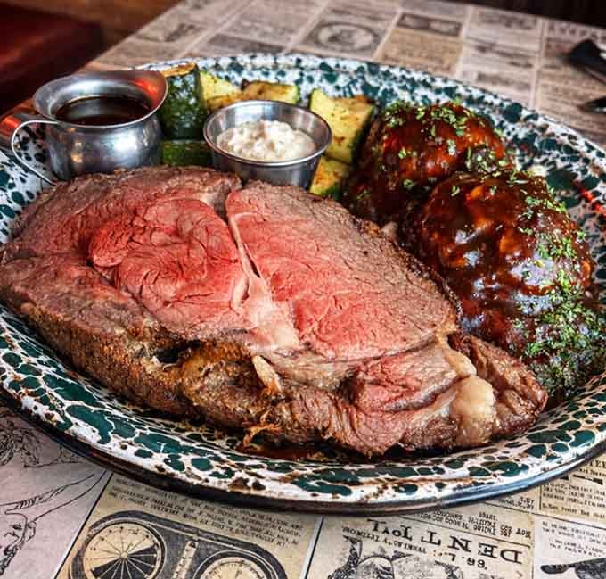 Prime rib sliced thick with those gorgeous German potatoes and glazed ribs looking like Sunday dinner perfection.