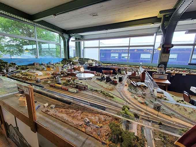 Model train enthusiasts, prepare to have your minds blown by this incredibly detailed miniature railroad landscape and setup.