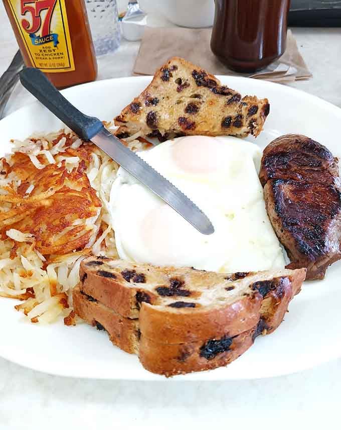 Raisin toast, perfectly cooked eggs, and hash browns that actually crisp up properly make mornings worth facing.