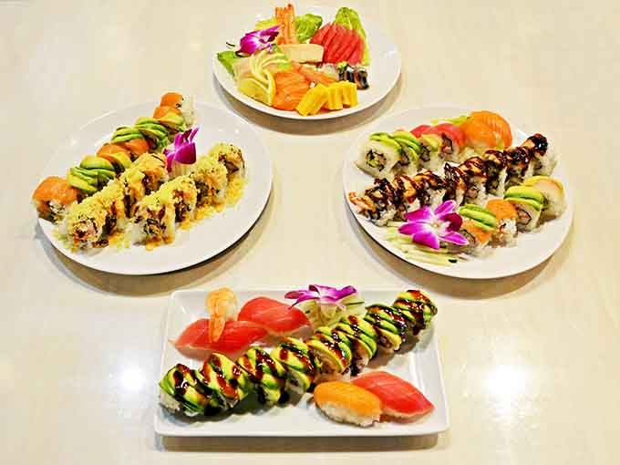 Four gorgeous plates of sushi that look like they belong in a Tokyo restaurant, not southern Indiana.