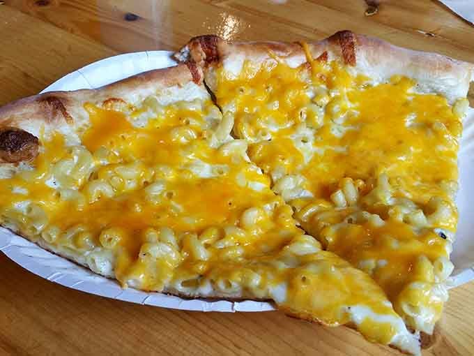 Behold the Mac N' Cheese pizza: proof that sometimes the best ideas sound completely ridiculous until you taste them.