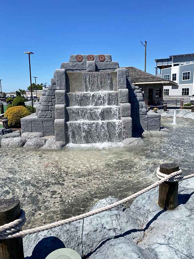 This cascading waterfall feature proves that mini golf can have better production values than some theme parks.