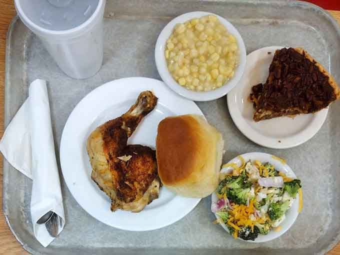 Golden fried chicken, creamy corn, fresh salad, and pie: basically the four food groups of Southern happiness.