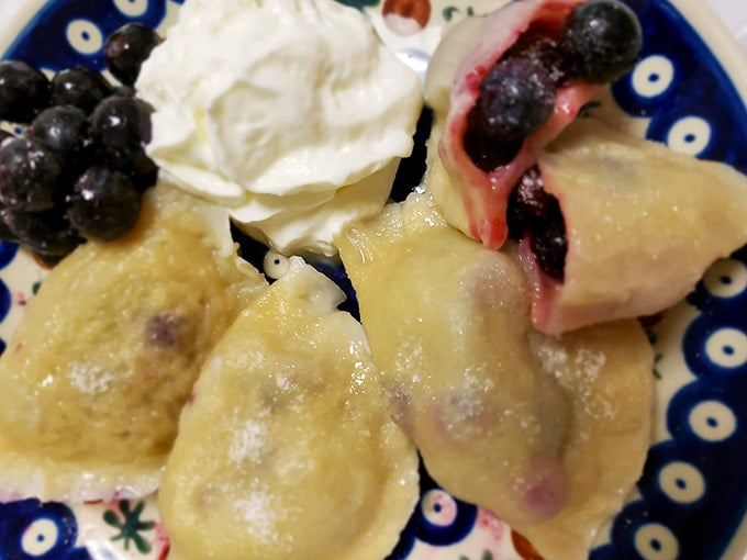 Sweet blueberry pierogis with a dollop of whipped cream prove that dumplings aren't just for dinner anymore.
