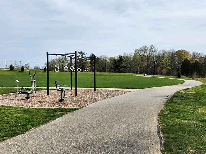 This walking path curves through green space like an invitation to actually use your legs for something.