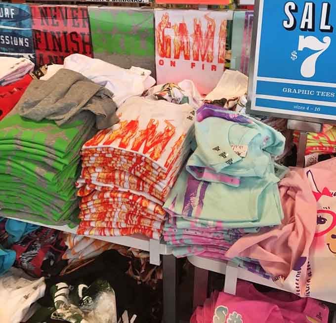 Graphic tees stacked high prove that self-expression doesn't require draining your retirement account to make a statement.