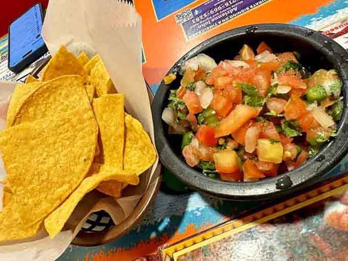 Fresh chips and homemade salsa, the opening act that somehow steals the show every single time.