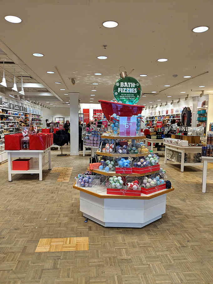 Bath fizzies stacked like colorful treasure, because sometimes self-care comes in fizzy, fragrant packages at outlet prices.