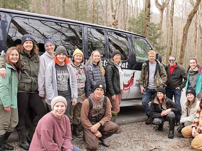 Happy visitors gather for another adventure, proving that getting outside beats scrolling through your phone.
