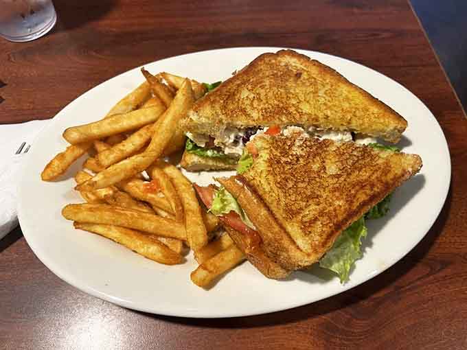 Golden-toasted perfection meets creamy chicken salad in a sandwich that makes lunch worth waking up for, honestly.