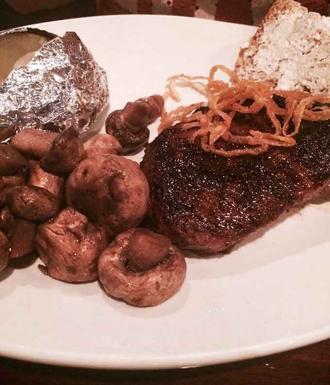 That perfect sear and those crispy onions aren't just garnish, they're a declaration of steakhouse excellence.