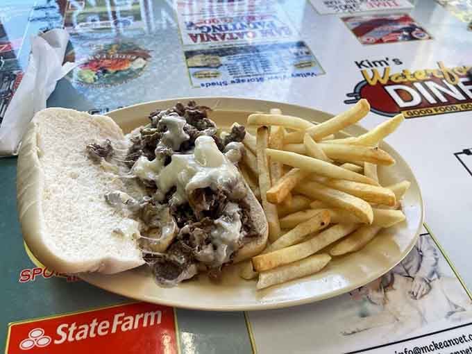 This steak and cheese situation with melted goodness proves that simple done well beats fancy every time.