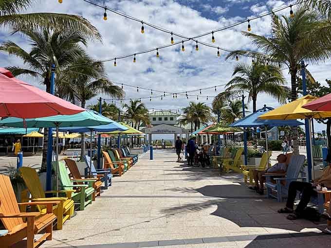 Colorful umbrellas and Adirondack chairs create the kind of scene that makes you forget your phone exists.