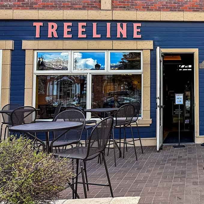 Treeline Kitchen's patio seating offers mountain views with your morning coffee, because why settle for boring breakfast scenery?