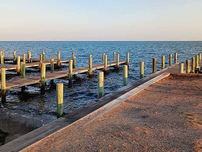 These weathered docks have seen more sunrises than your average early bird gets worms for.