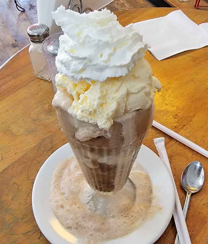 This towering chocolate soda float defies physics, gravity, and any notion that you'll finish it without help&mdash;glorious help.