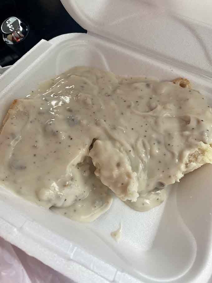 Behold the star of the show: fluffy biscuits drowning in thick, sausage-loaded gravy that'll change your life.