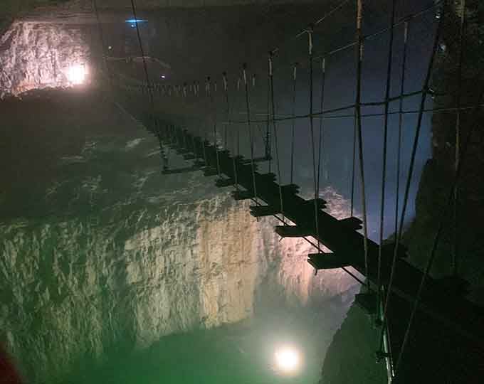 That moment when you realize you're about to walk across a suspension bridge in a cave. Deep breaths recommended.