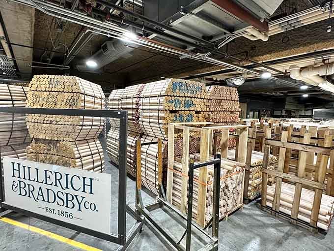 Stacks of wood billets waiting to become Louisville Sluggers, like a lumberyard where every piece has dreams of the big leagues.